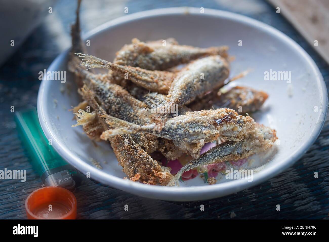 Ready small sardines, fish fried, Chefchouen, Morocco Stock Photo - Alamy