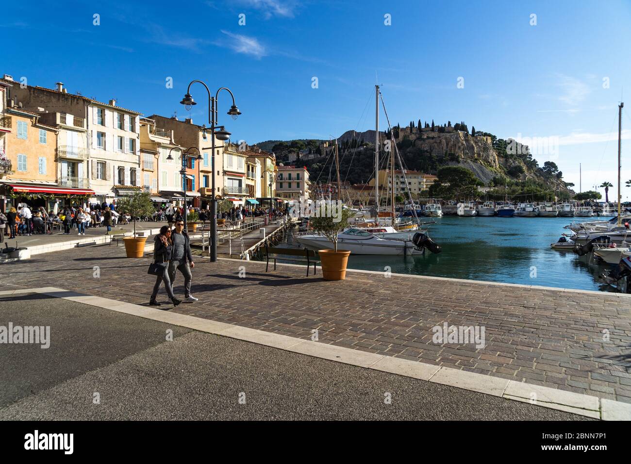 Waterfront promenade at Cassis marina, a famous resort town in Southern ...