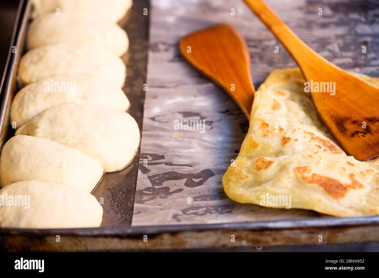 Preparation of Moroccan msemen pancakes Stock Photo - Alamy