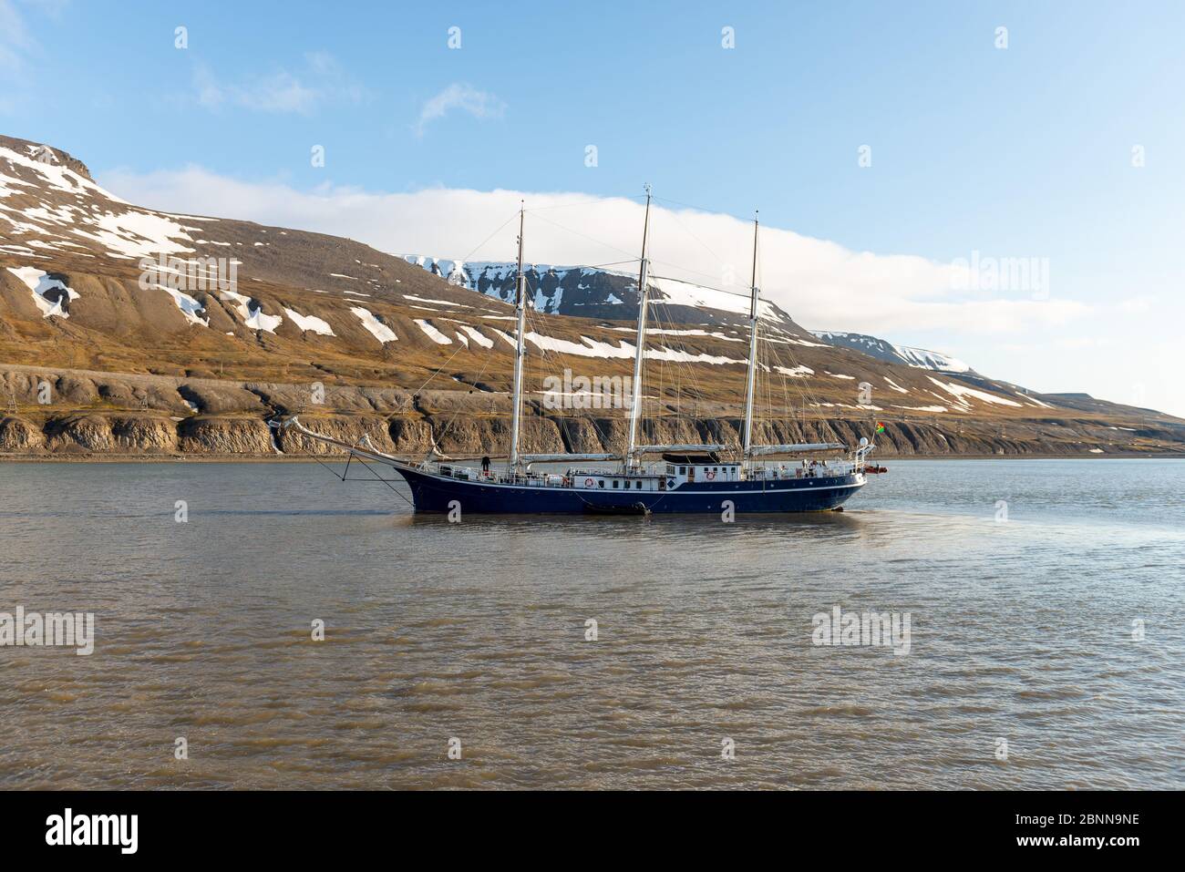 Arctic landscape in Svalbard with three masts sailing ship Stock Photo ...