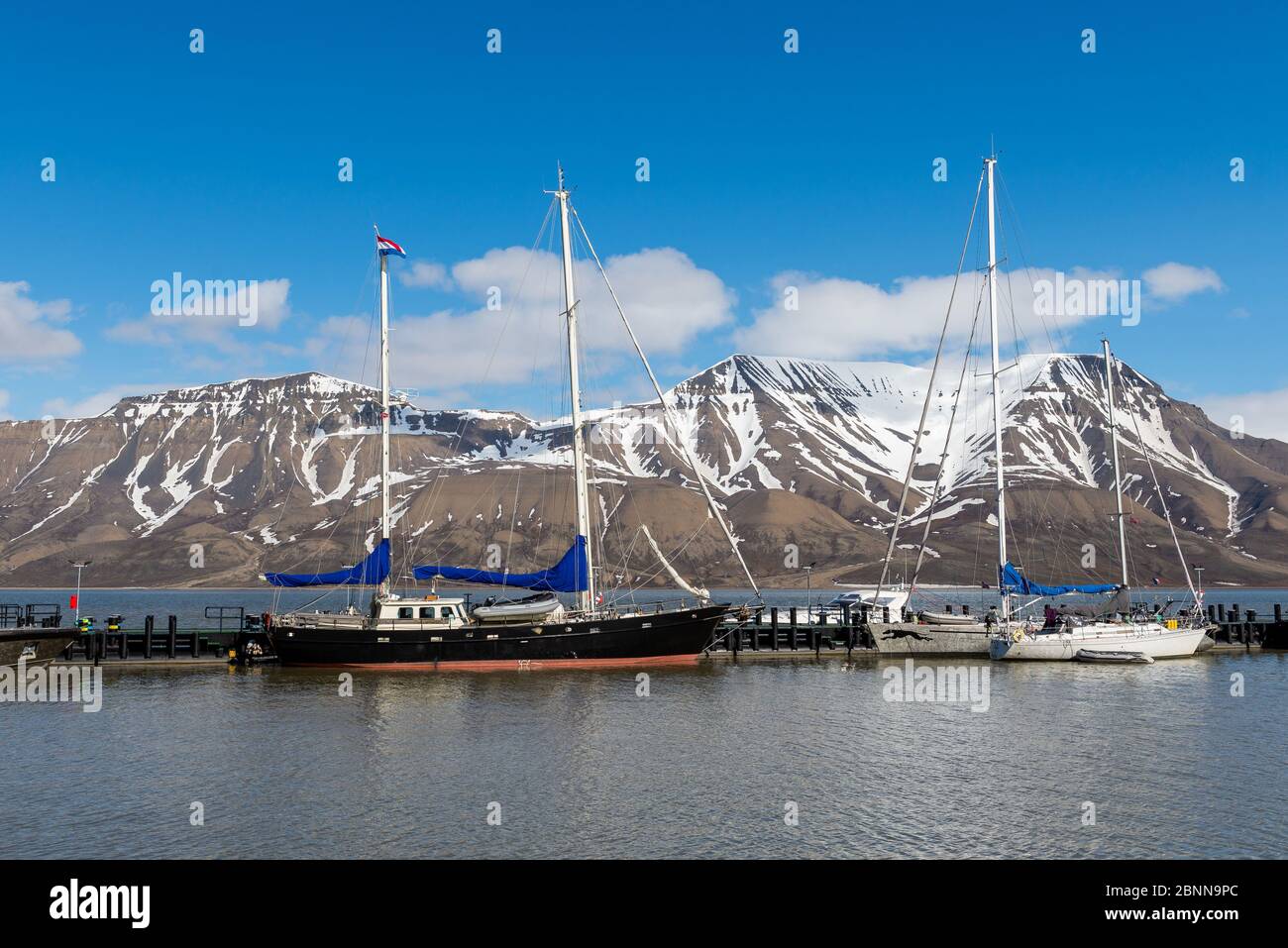 Sailing yacht in port of Longyearbyen, Svalbard archipelago Stock Photo ...