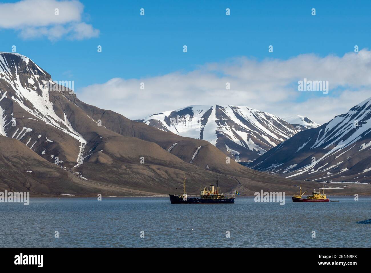 Small fishing vessel in port of Longyearbyen, Svalbard archipelago ...