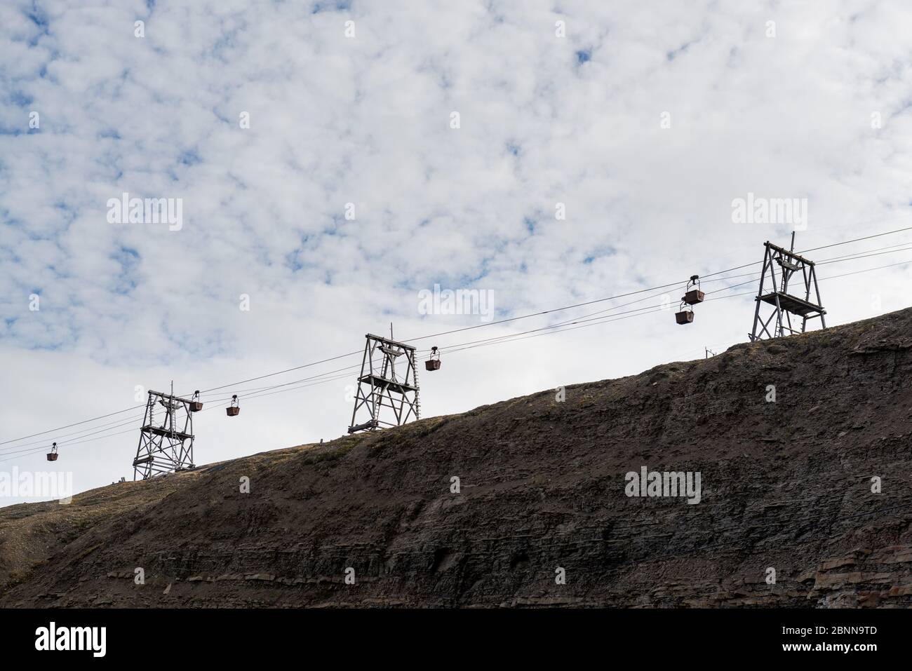 Arctic landscape with old wooden mine transportation cableway in ...