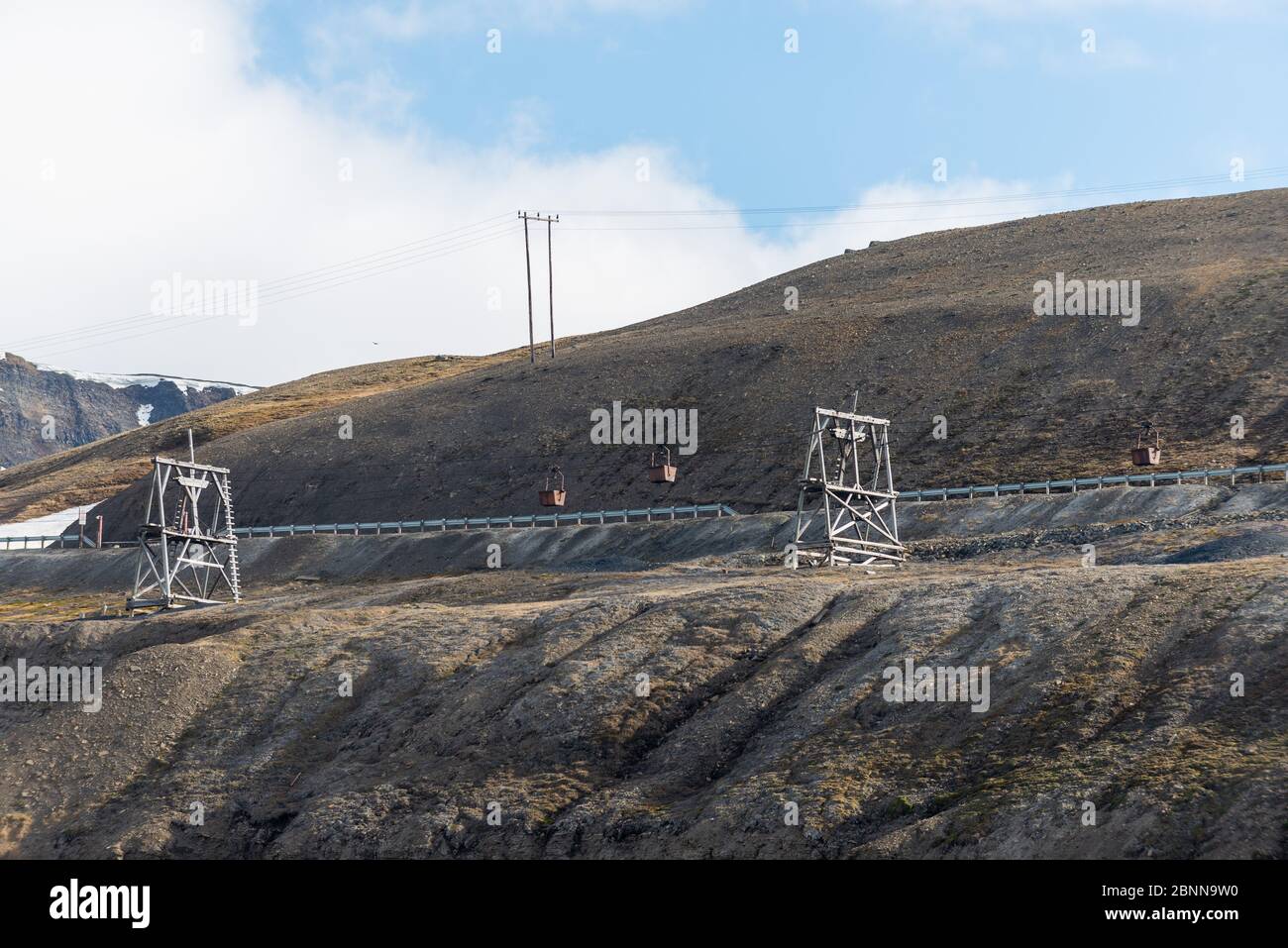 Arctic landscape with old wooden mine transportation cableway in ...