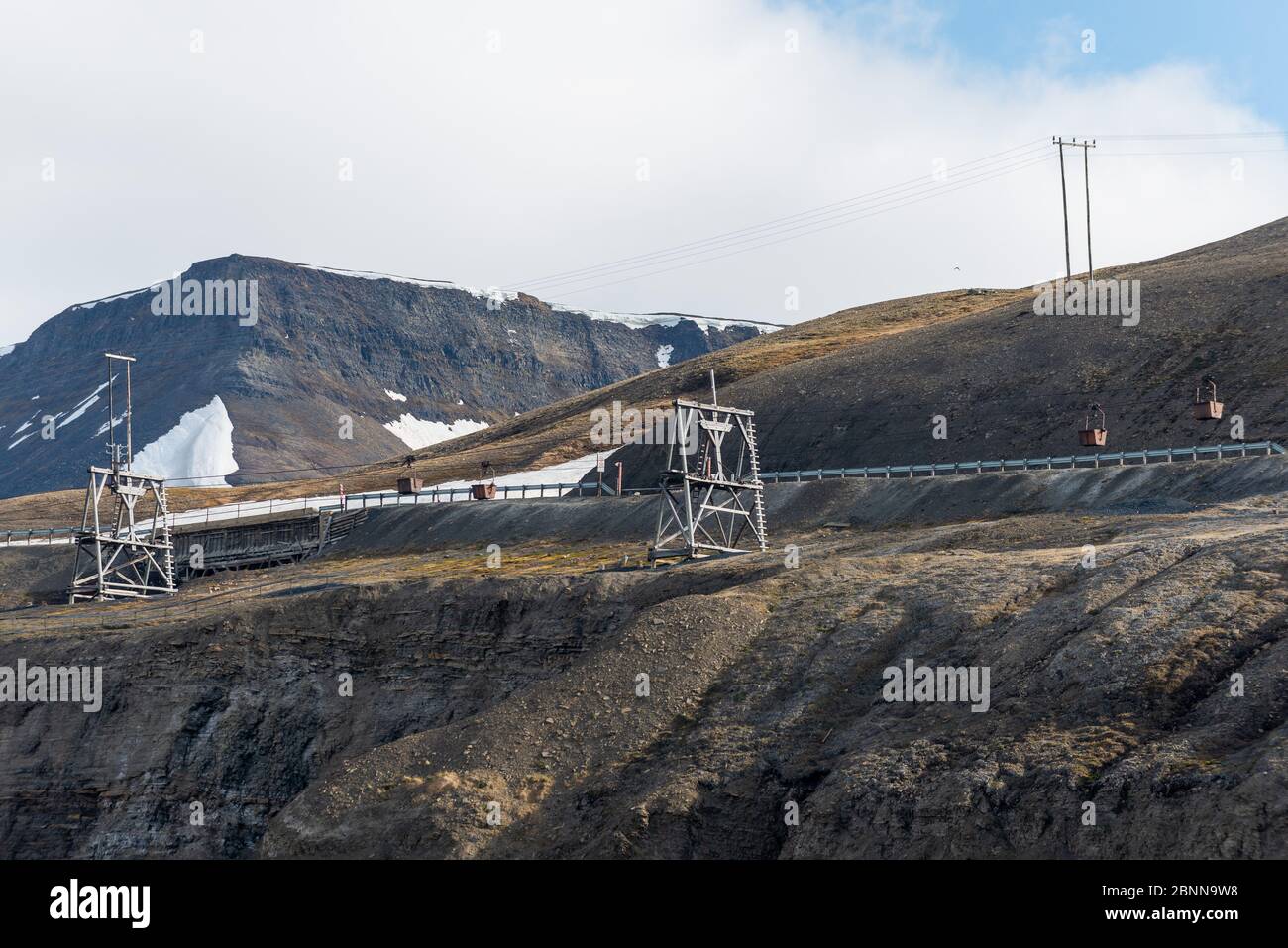 Arctic landscape with old wooden mine transportation cableway in ...