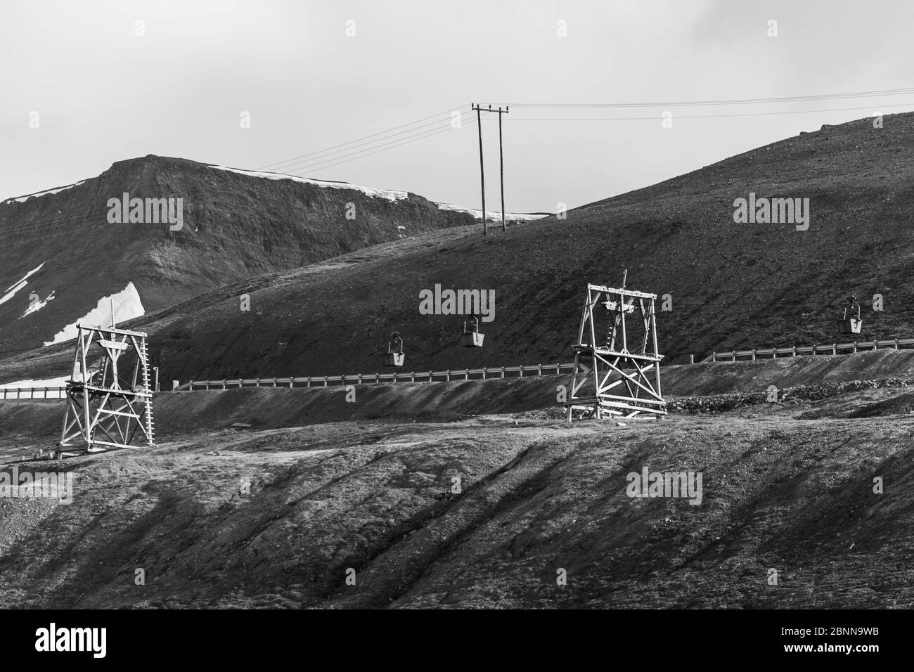 Arctic landscape with old wooden mine transportation cableway in ...