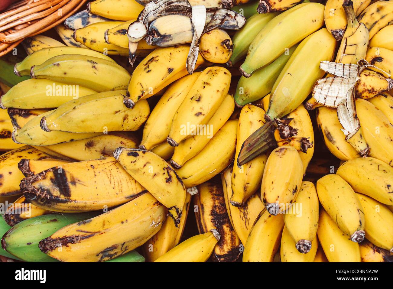 Clusters of ripe yellow bananas photographed on a fruit market ...