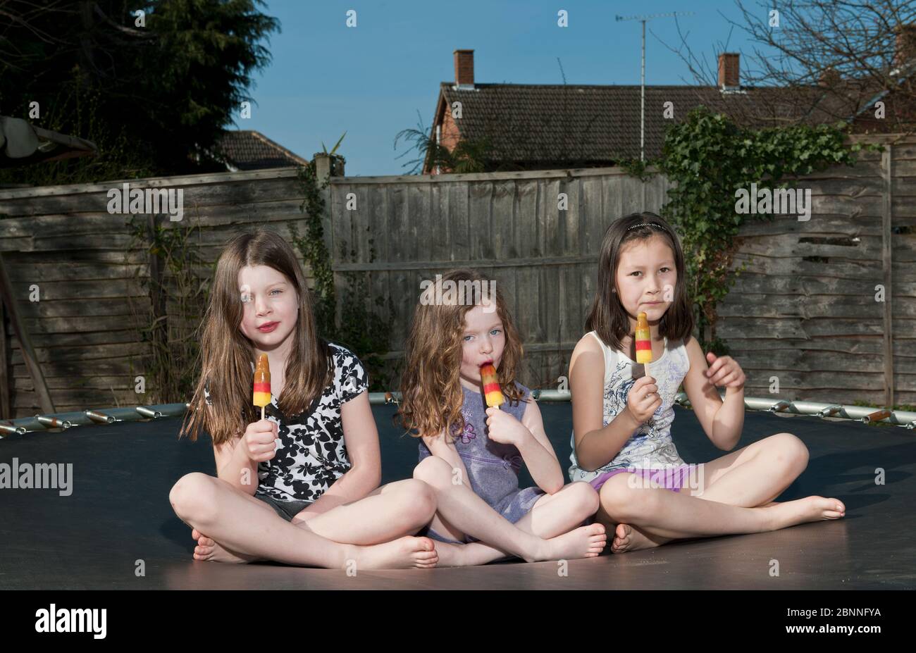 Children and trampoline group hi-res stock photography and images - Alamy