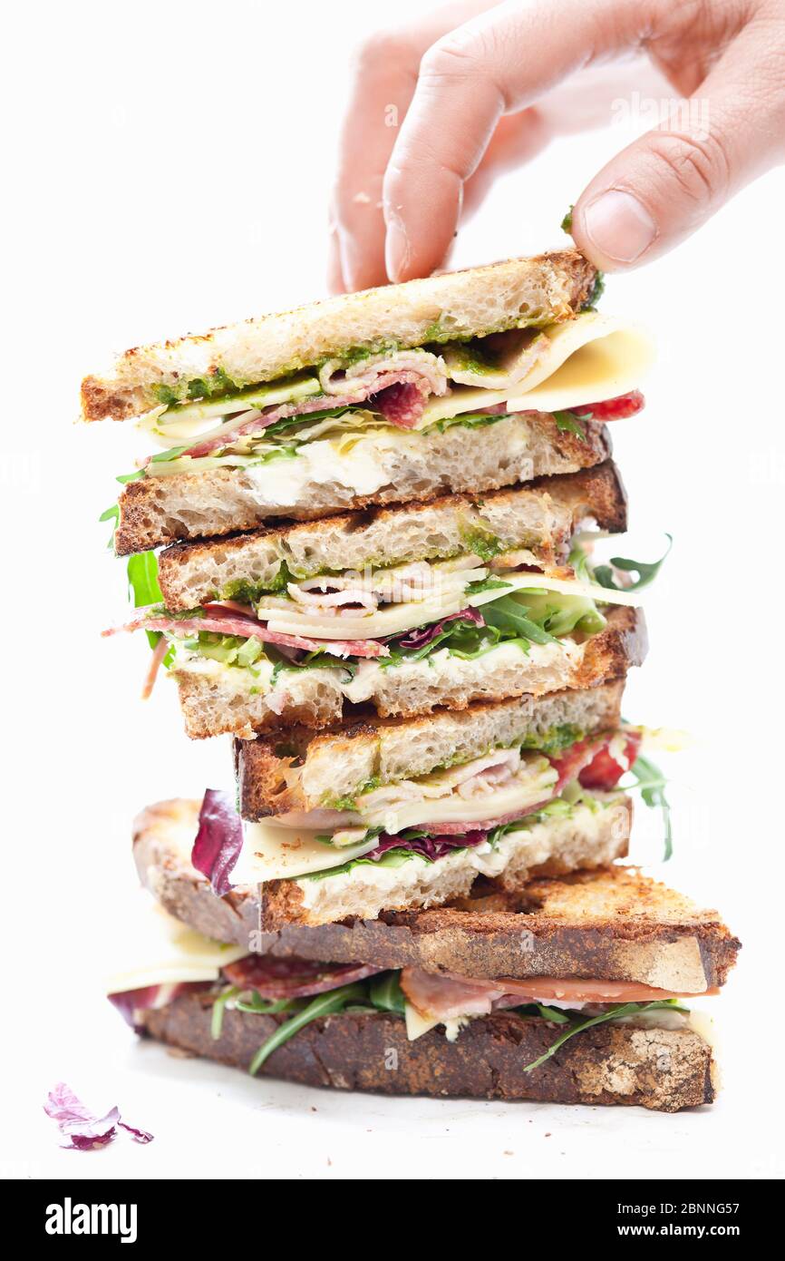stack of sandwiches on white background Stock Photo - Alamy