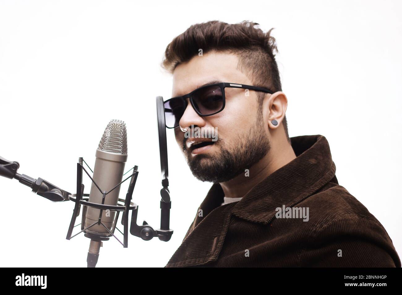 Person microphone singing passion hi-res stock photography and images ...