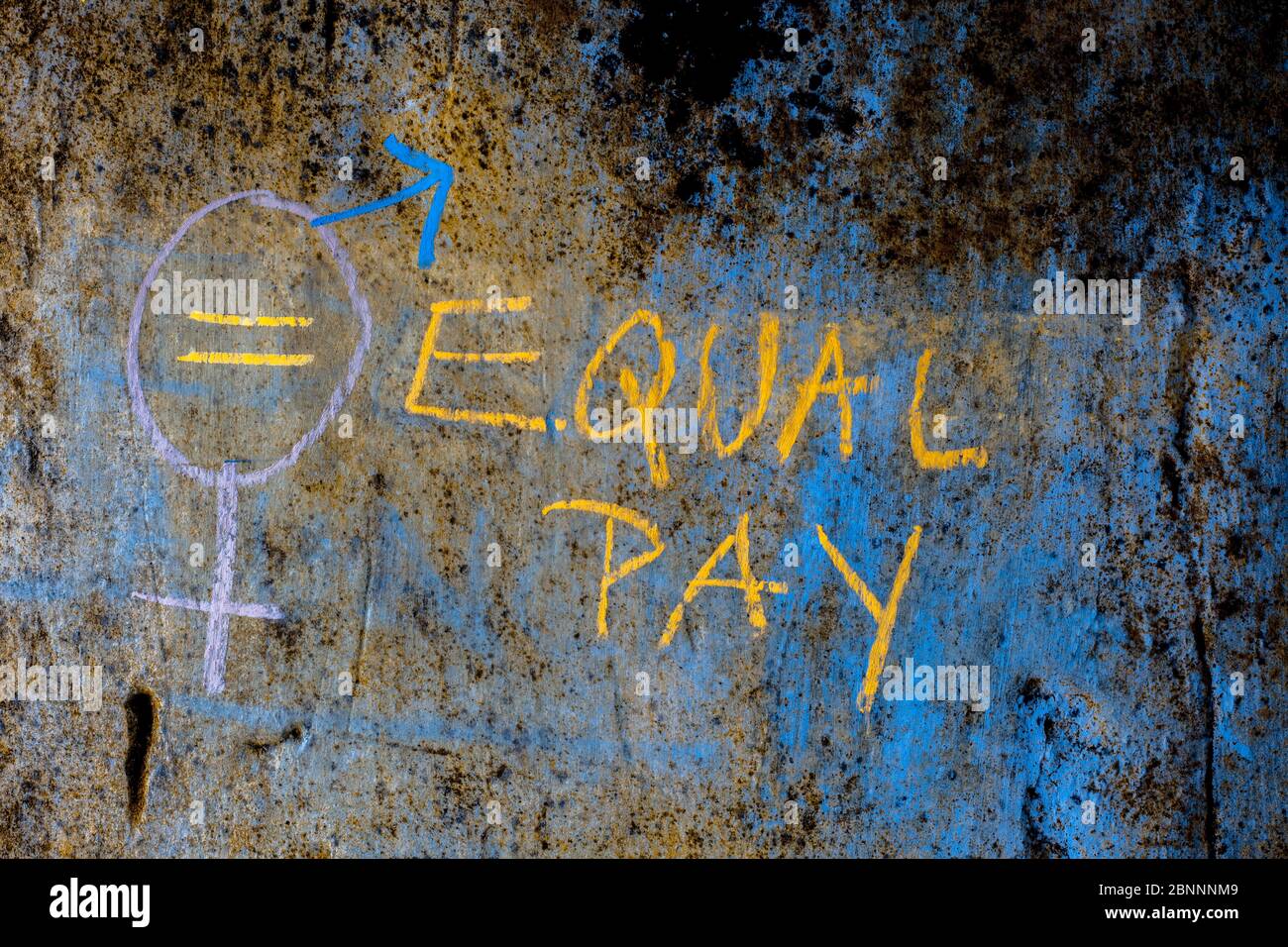 Creative representation of Equal pay with a bigender symbol over a ...