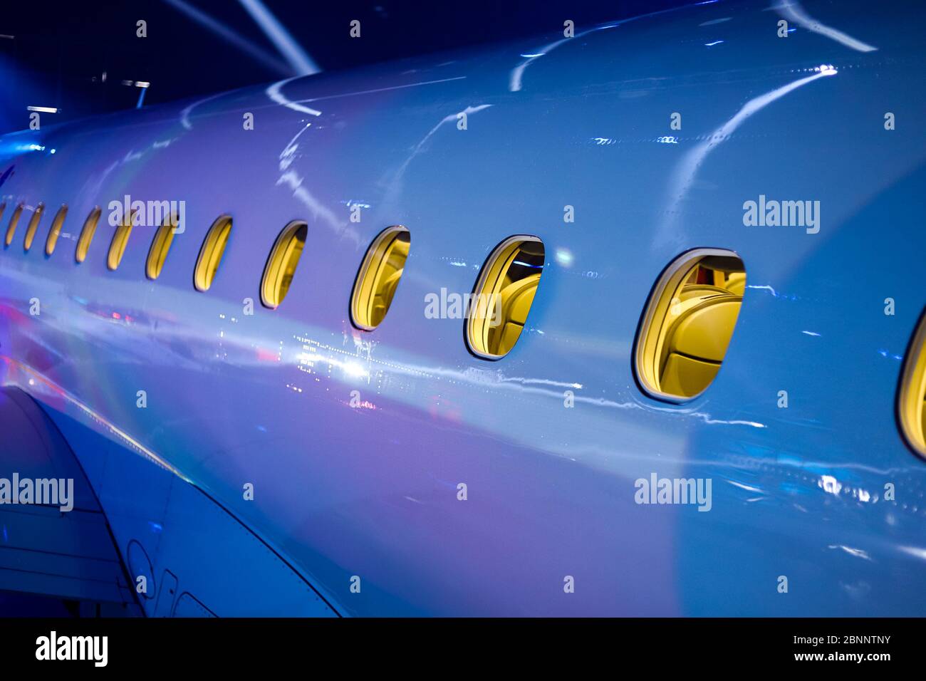The airplane portholes in airport Stock Photo - Alamy