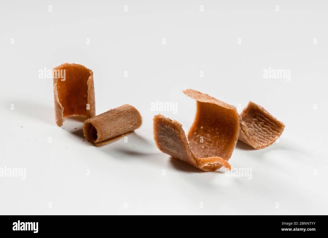 group of chocolate shavings isolated on white background Stock Photo ...