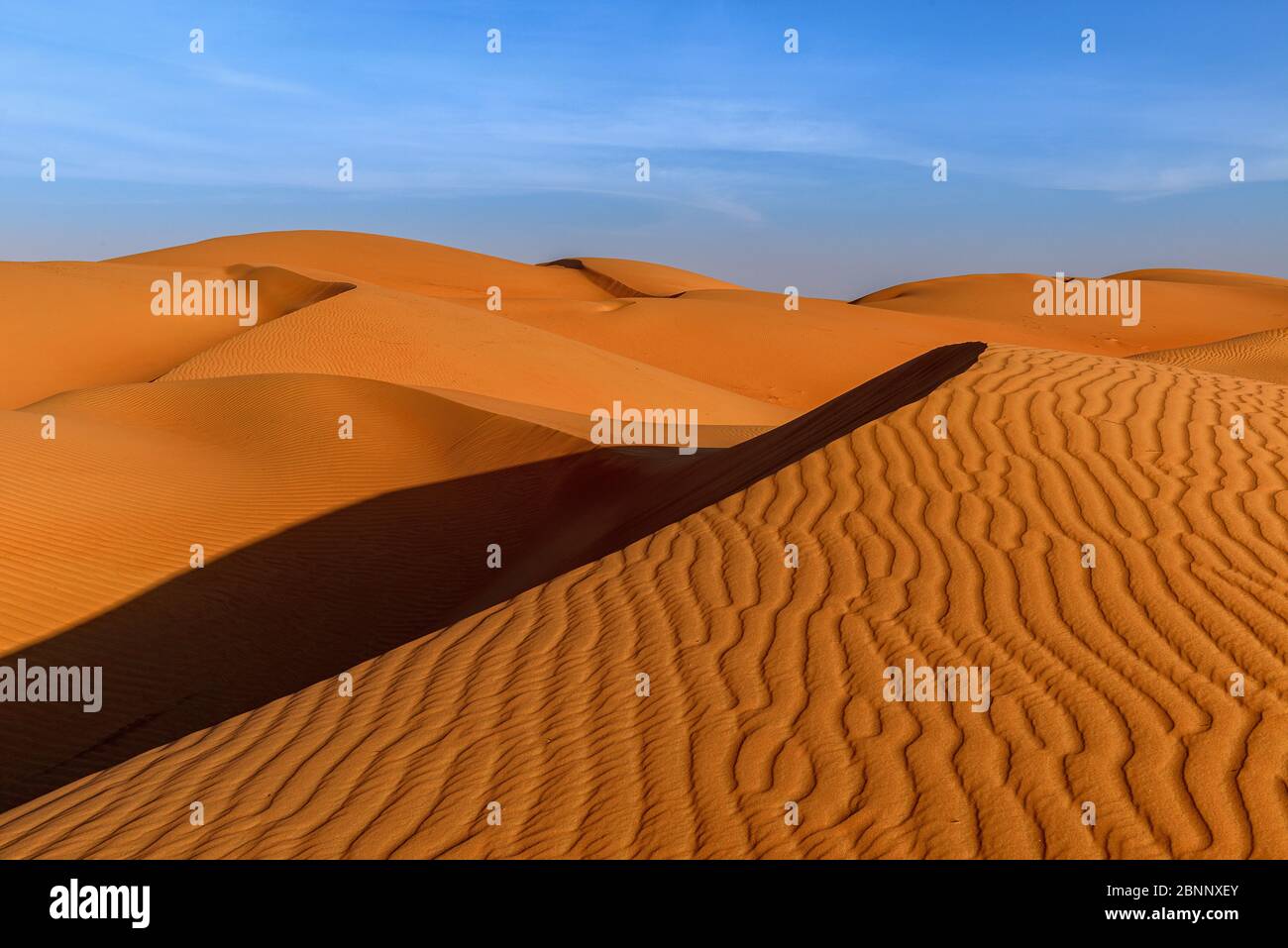 Blue desert sky with clouds hi-res stock photography and images - Alamy