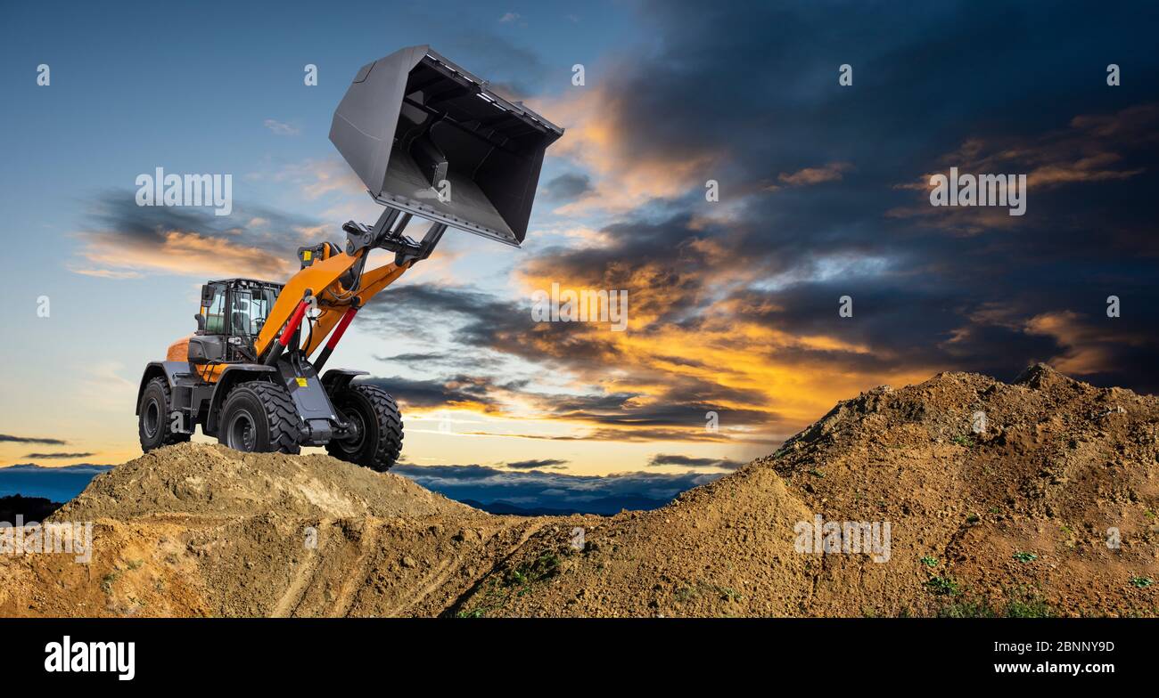 Construction site with construction machine / excavator Stock Photo - Alamy