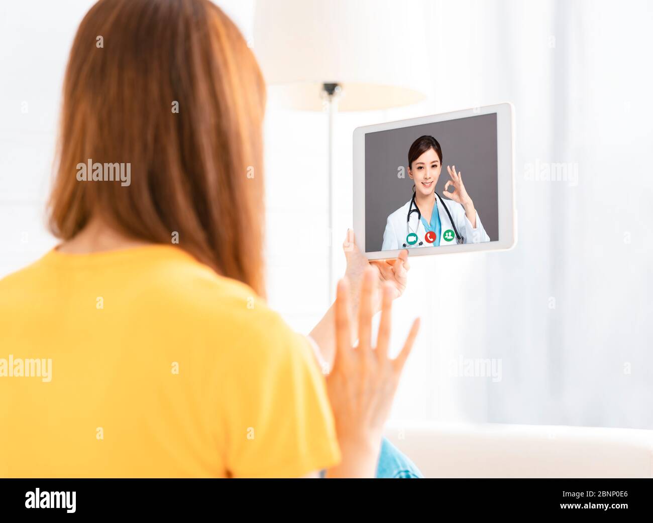 Woman video call doctor hi-res stock photography and images - Alamy