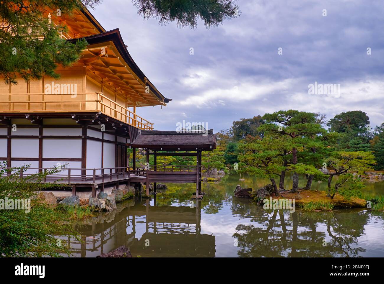 The Golden Pavilion on the shore of Mirror lake with Dekame (leaving ...