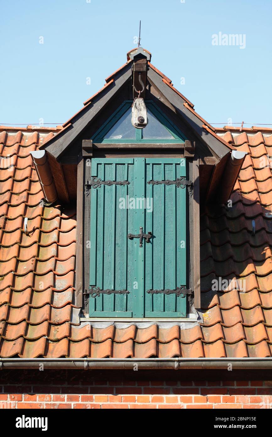 Old roof gable with closed wooden shutters hi-res stock photography and ...