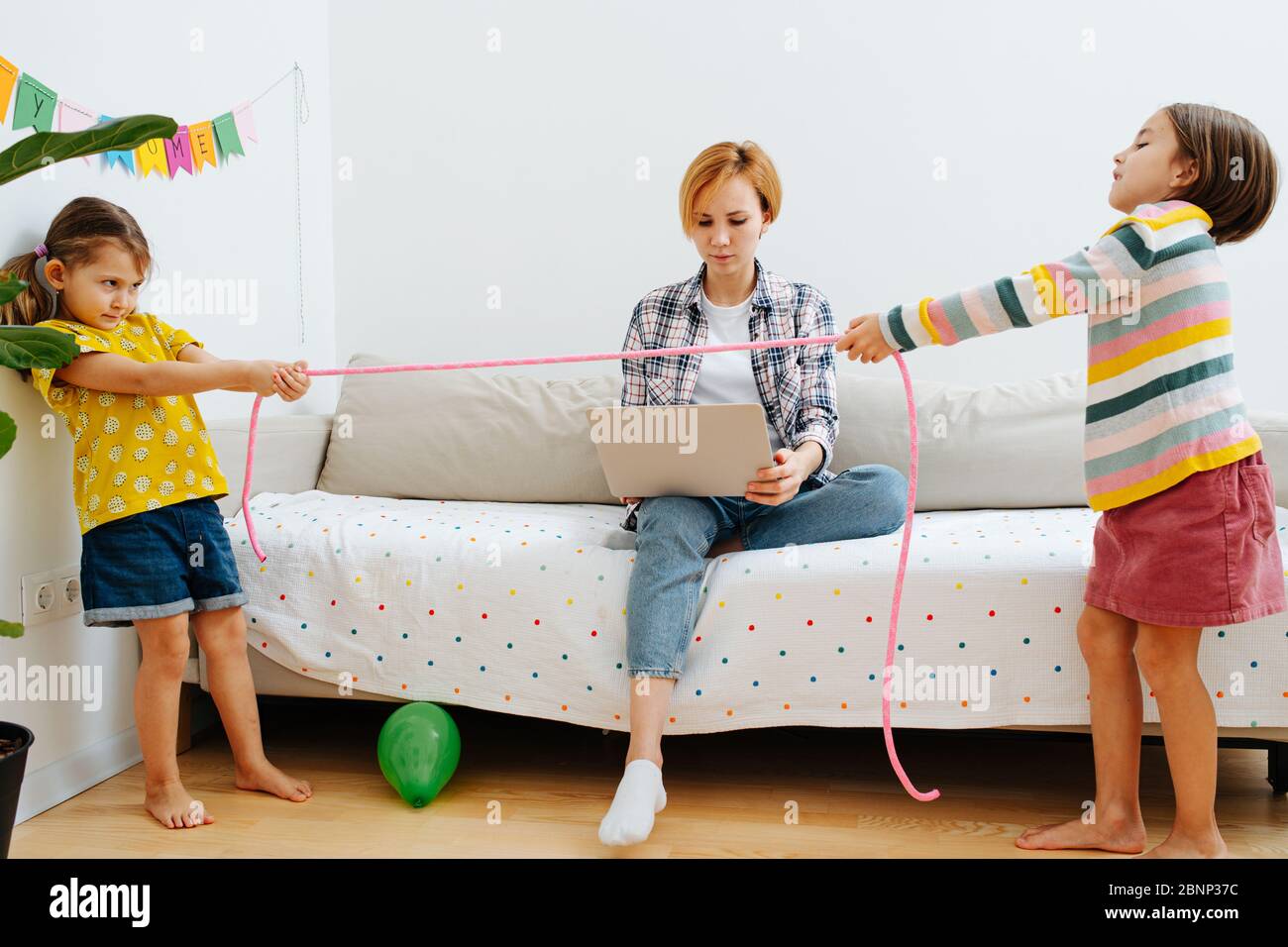 Kids pulling rope hi-res stock photography and images - Alamy