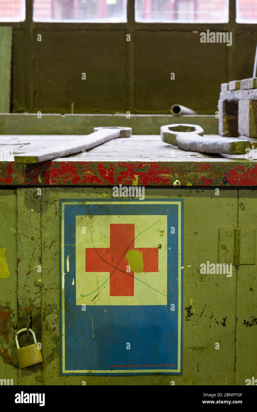 Workbench, locked door, medical signs, first aid Stock Photo - Alamy