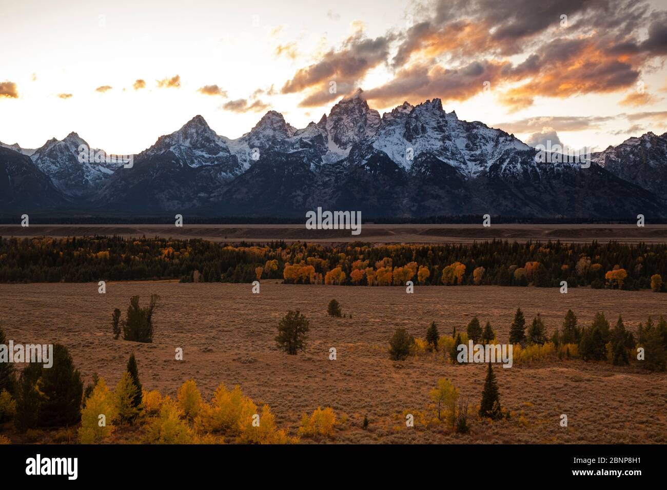 WY04356-00...WYOMING - Autumn sunset over The Grand and the Snake River ...