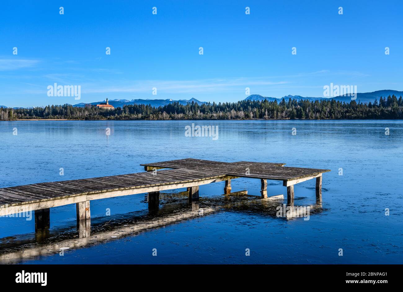 Kirchsee with reutberg abbey against prealps hi-res stock photography ...