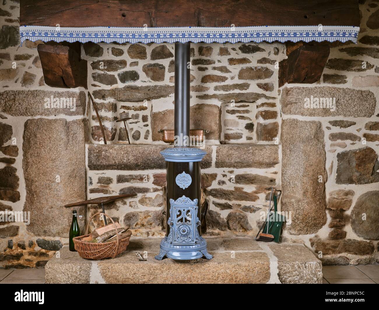 Fire pit in a typical Breton country house with a cannon oven in ...