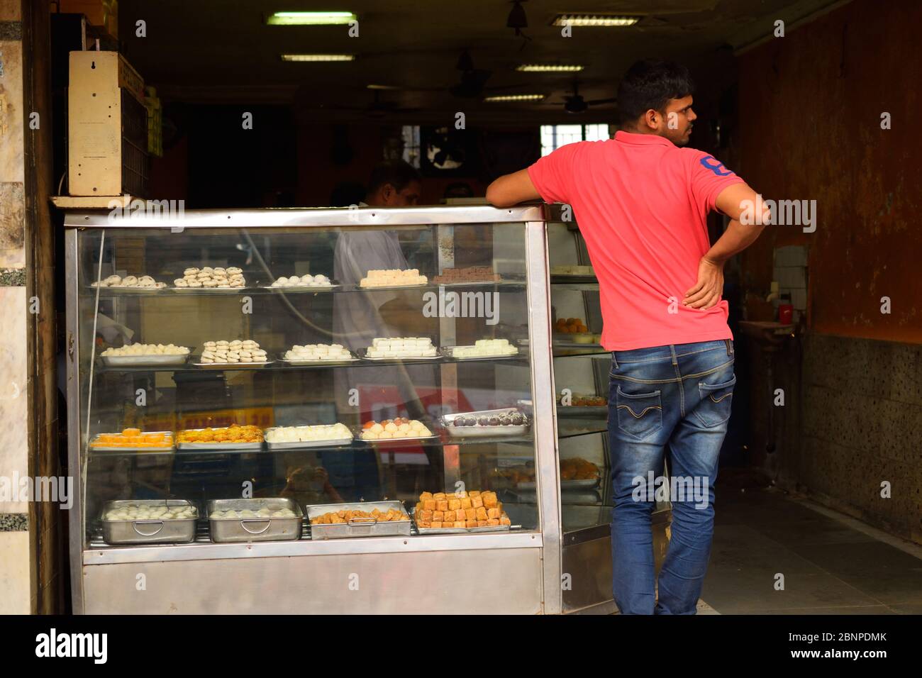 Traditional indian sweet shop hi-res stock photography and images - Alamy