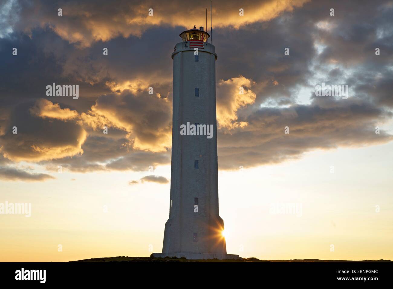 Sunset behind the Malarrif lighthouse on the south coast of the ...
