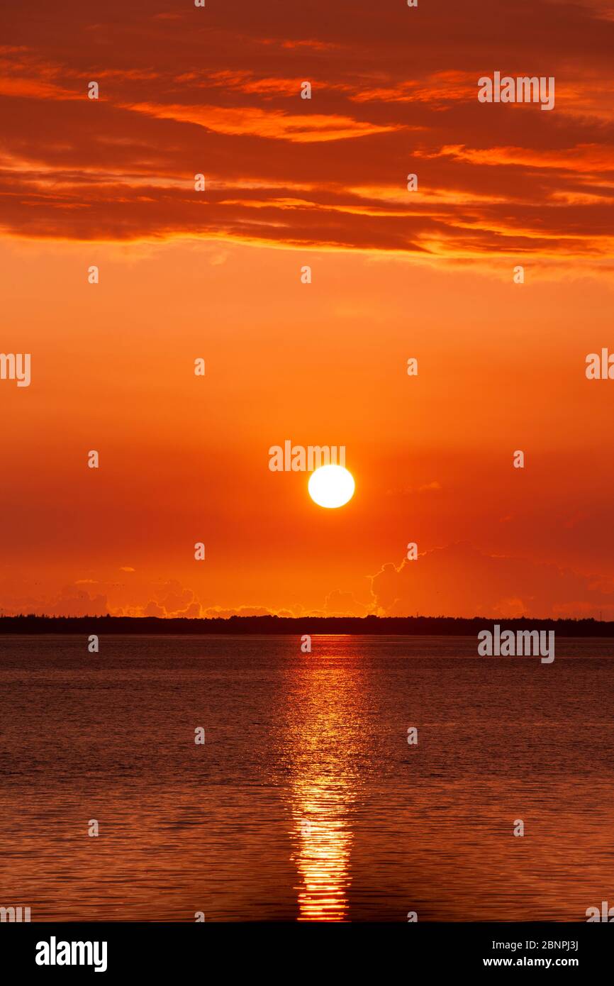 Red sunset by the sea Stock Photo - Alamy