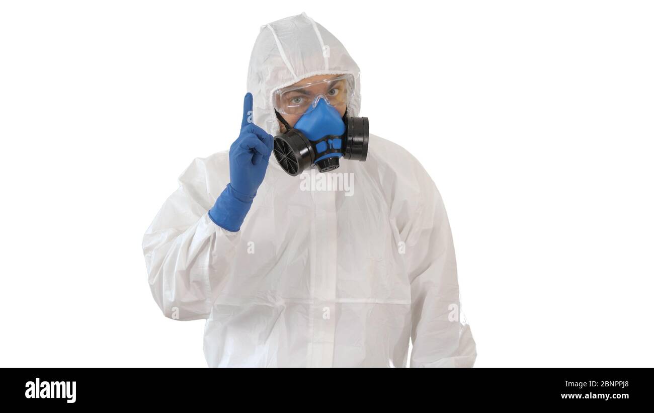 Doctor wearing hazard suit pointing with finger up wanting your ...