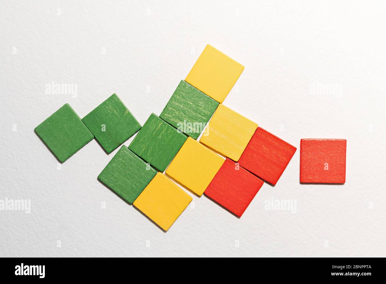Different colorful squares wooden on white background. Geometric shapes ...