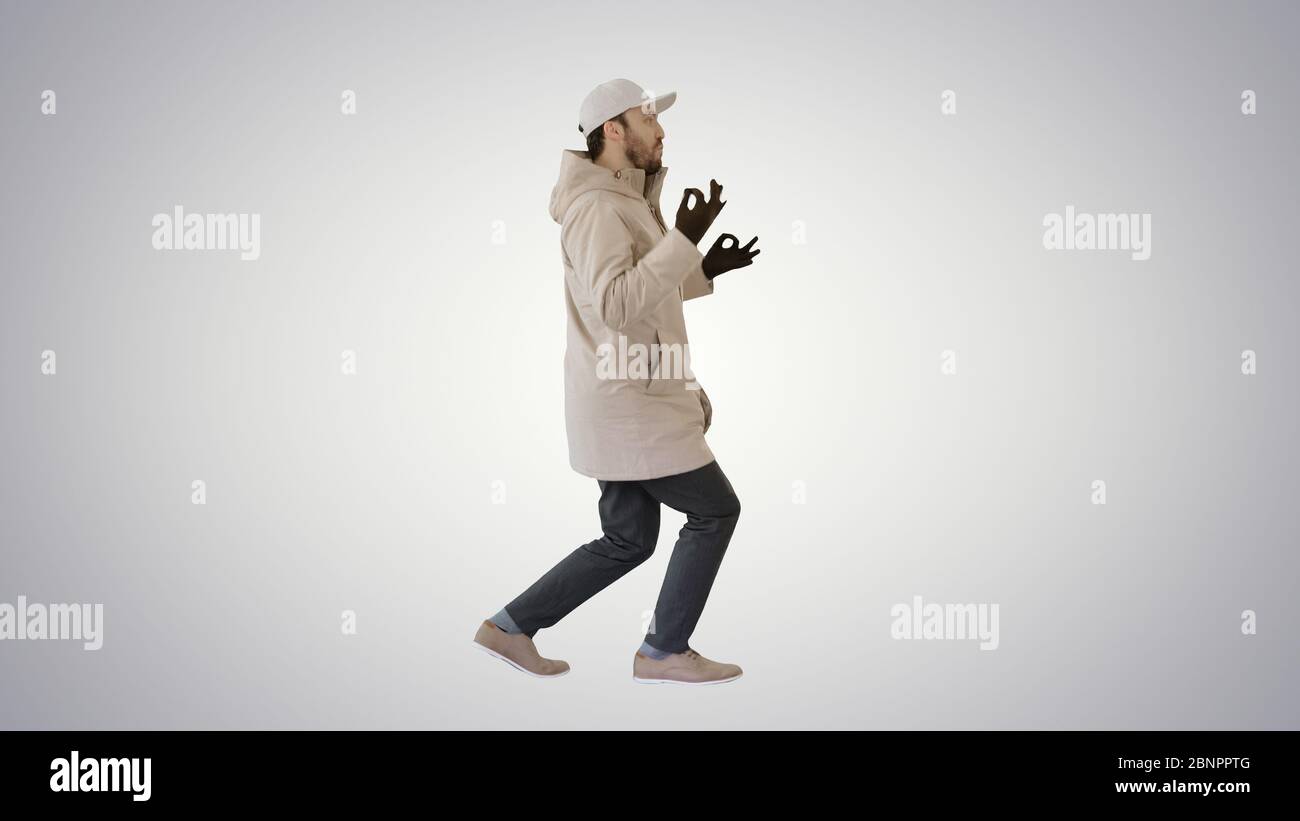 Hip-hop man singing rap, walking and making gestures on gradient ...