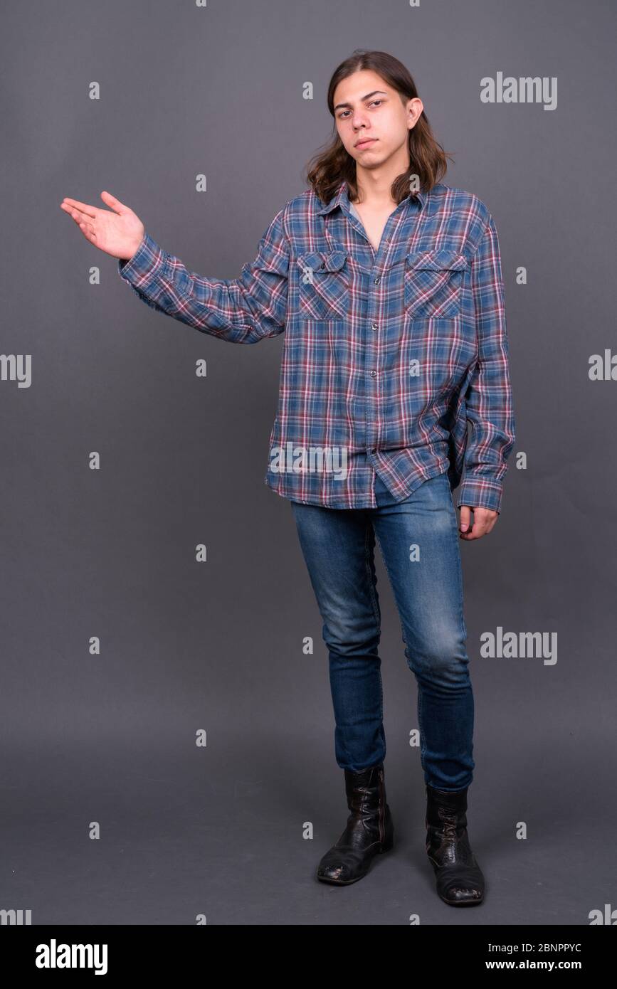 Guy long hair showing hi-res stock photography and images - Alamy