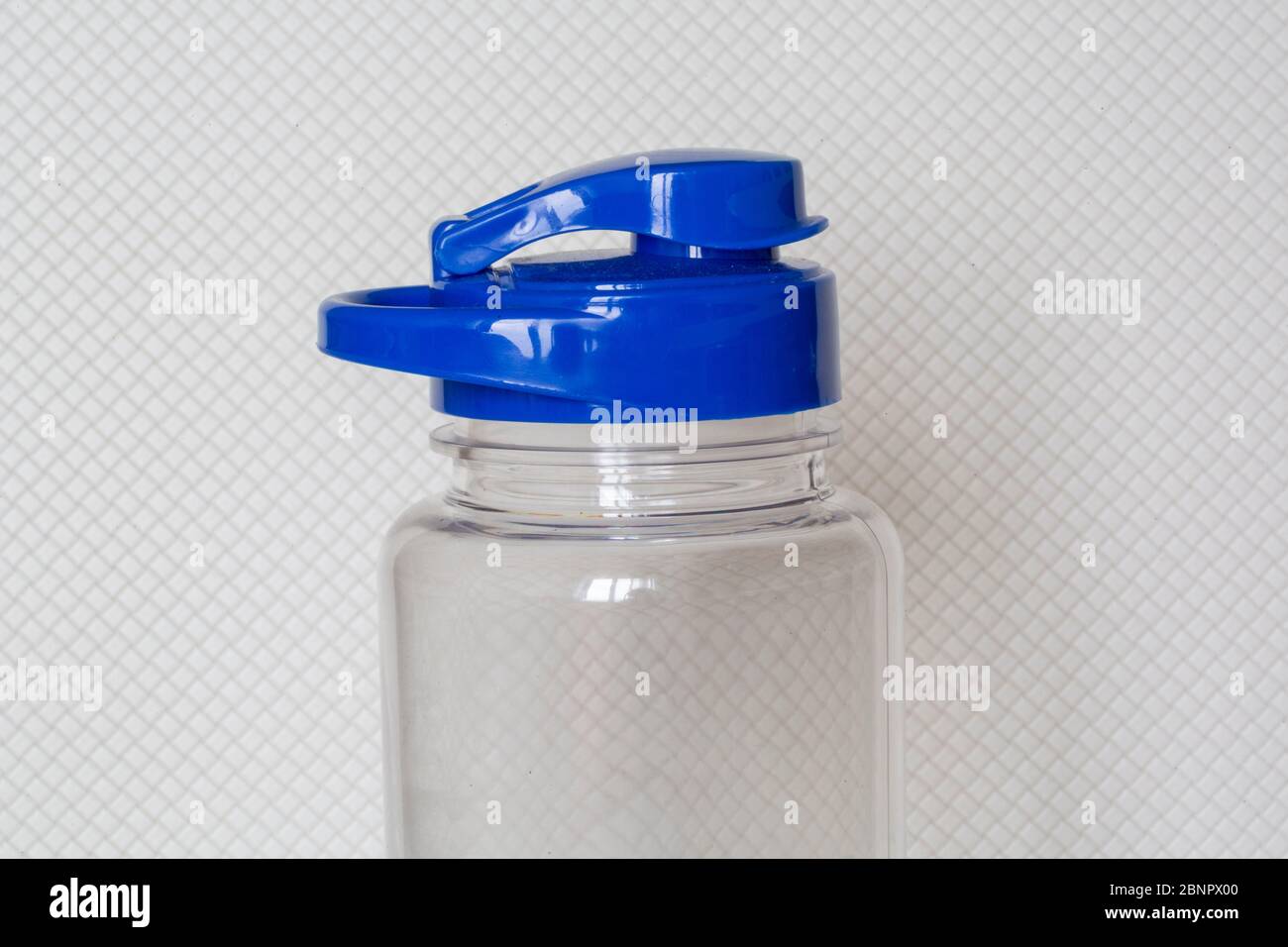 plastic water bottle on abstract background Stock Photo - Alamy