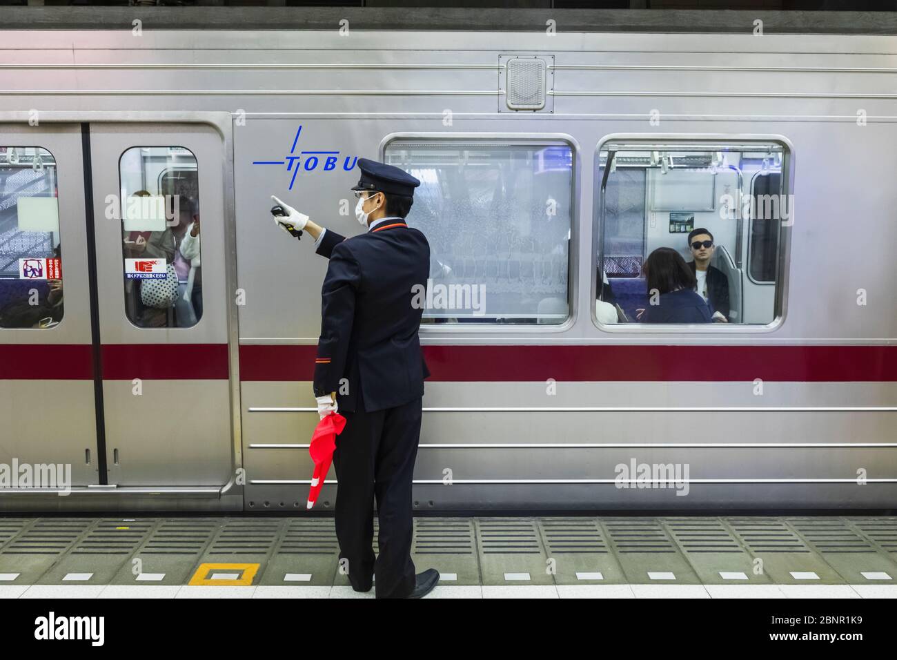 Japan, Honshu, Tokyo, Asakusa Station, Tobu Railways, Platform Guard ...