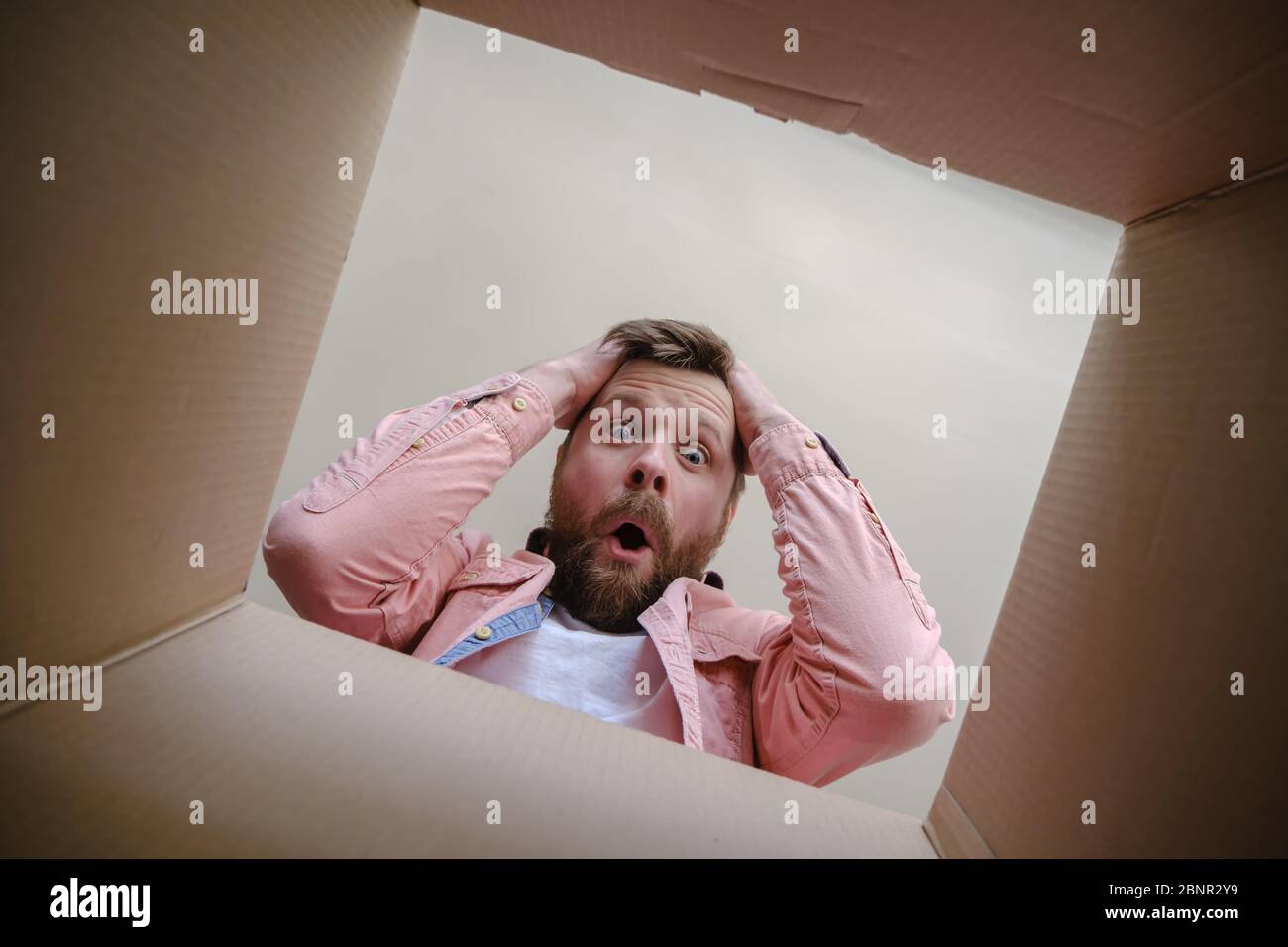 Unpacking box man sad hi-res stock photography and images - Alamy