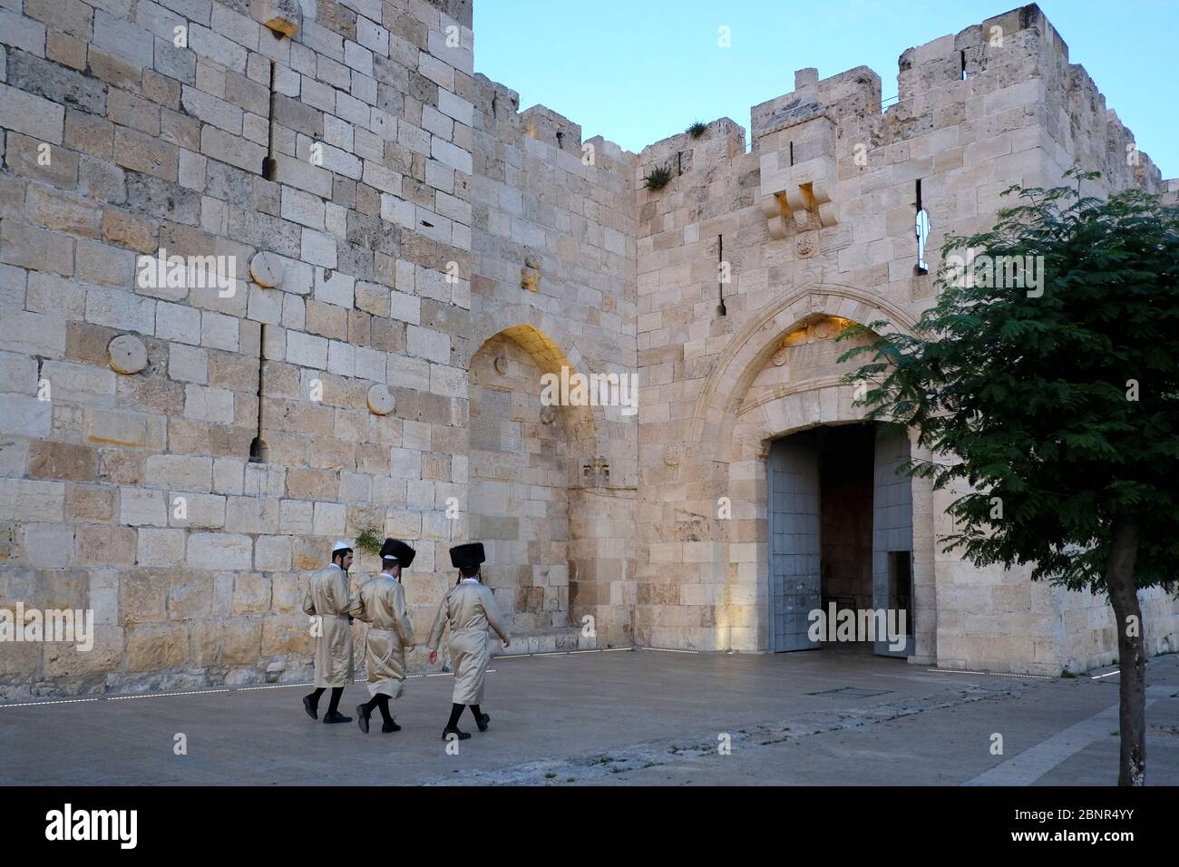 Ultra orthodox Jews walk through Jaffa Gate or Bab al-Khalil one of ...