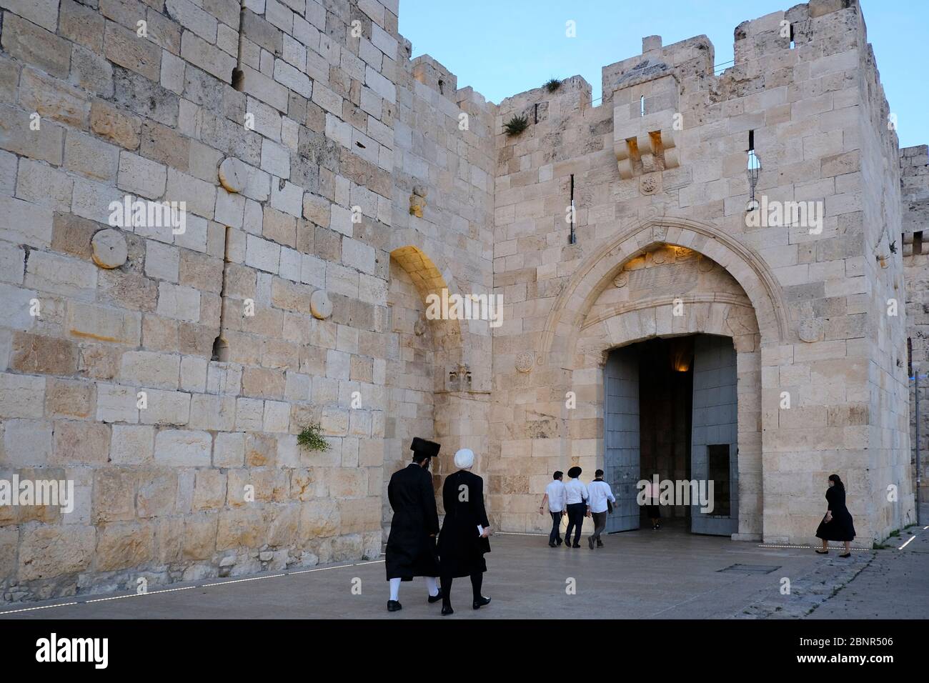 Ultra orthodox Jews walk through Jaffa Gate or Bab al-Khalil one of ...
