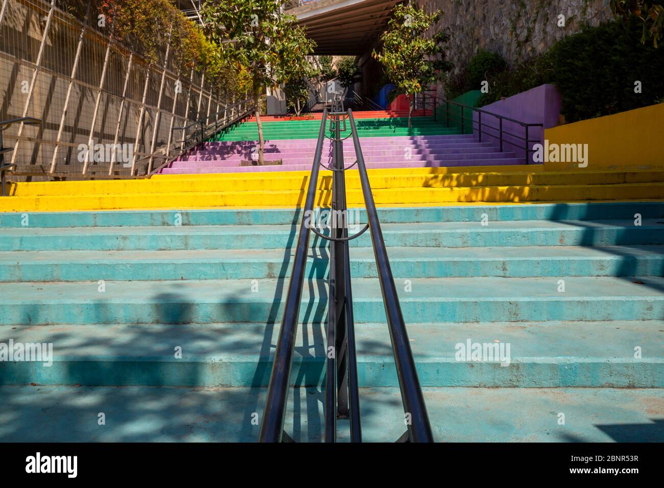 Stairs painted in rainbow colors background Stock Photo - Alamy