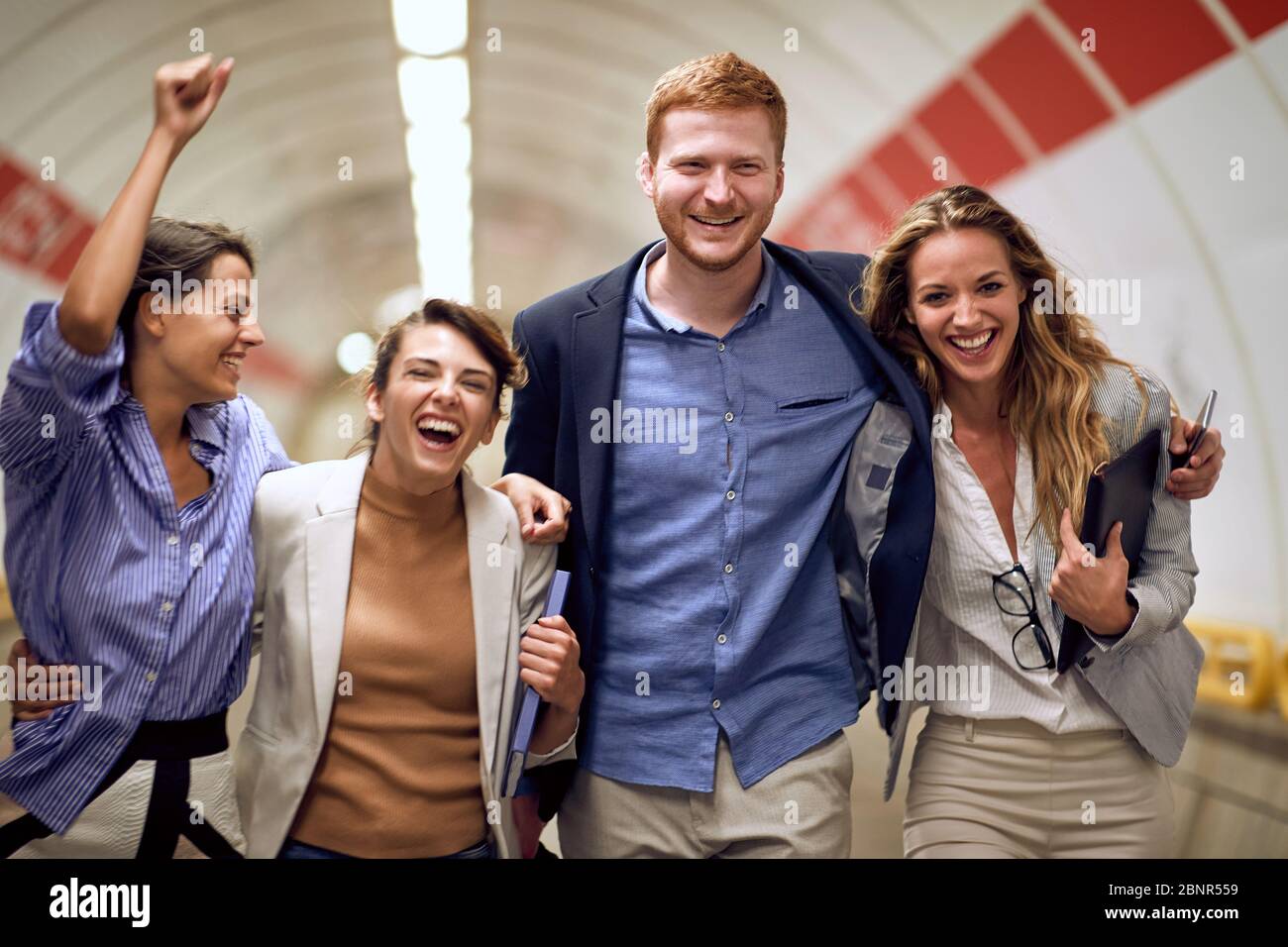group of young smiling caucasian business people having fun Stock Photo ...