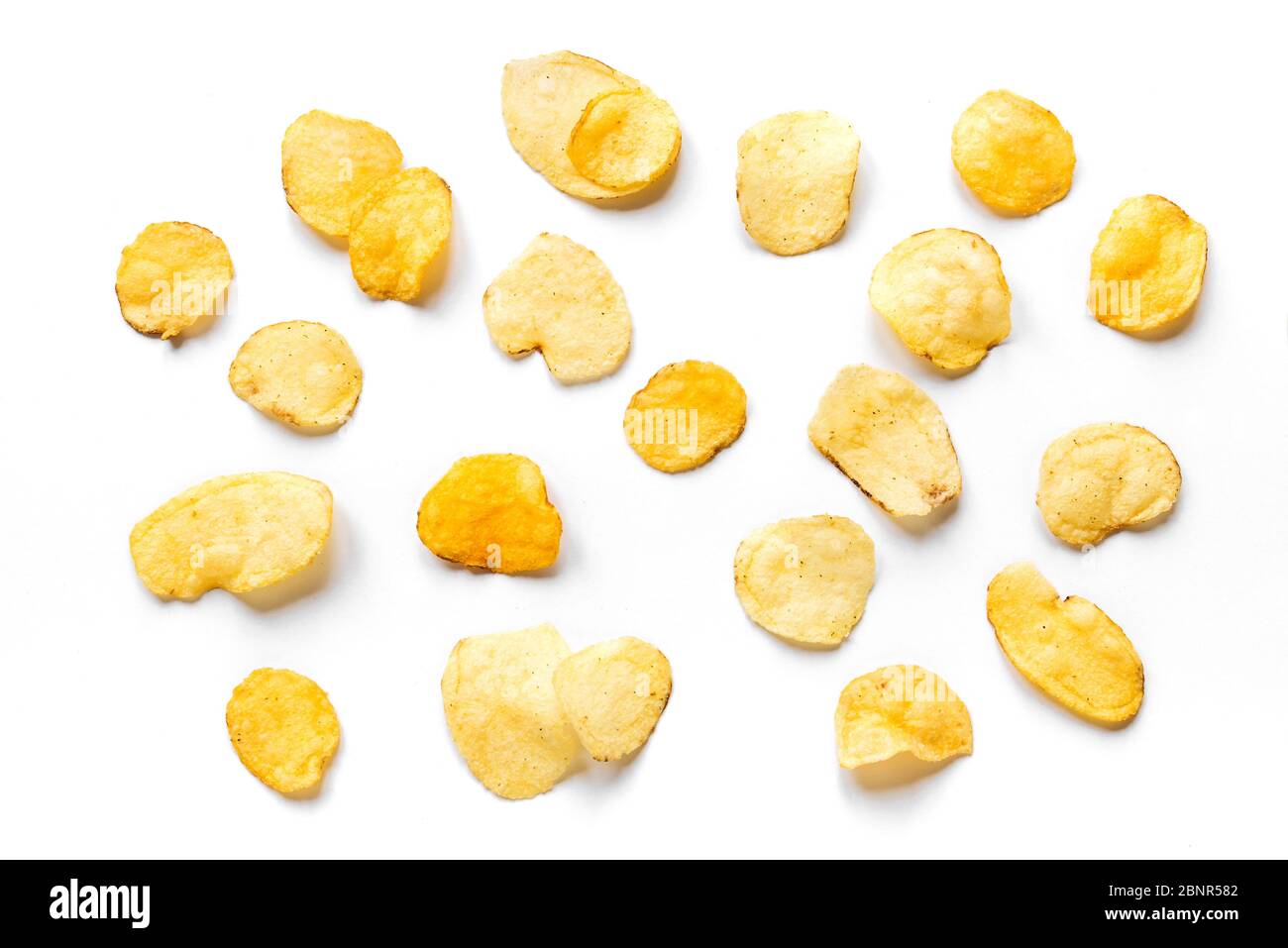 Potato chips isolated on white background. Crispy potato chips creative ...