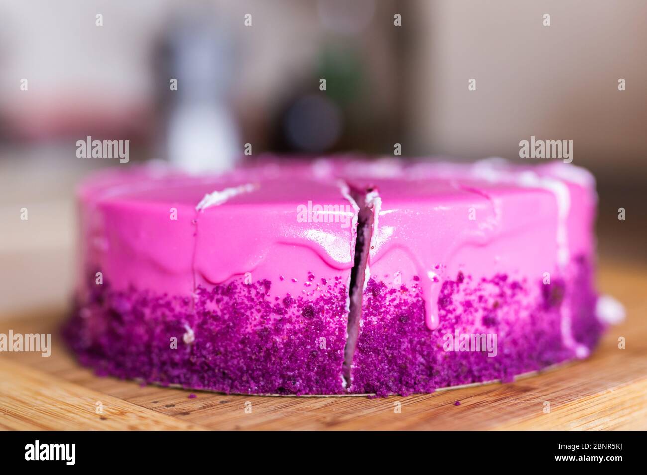 Pink and violet birthday cake. Dessert, holidays and delicious concept ...