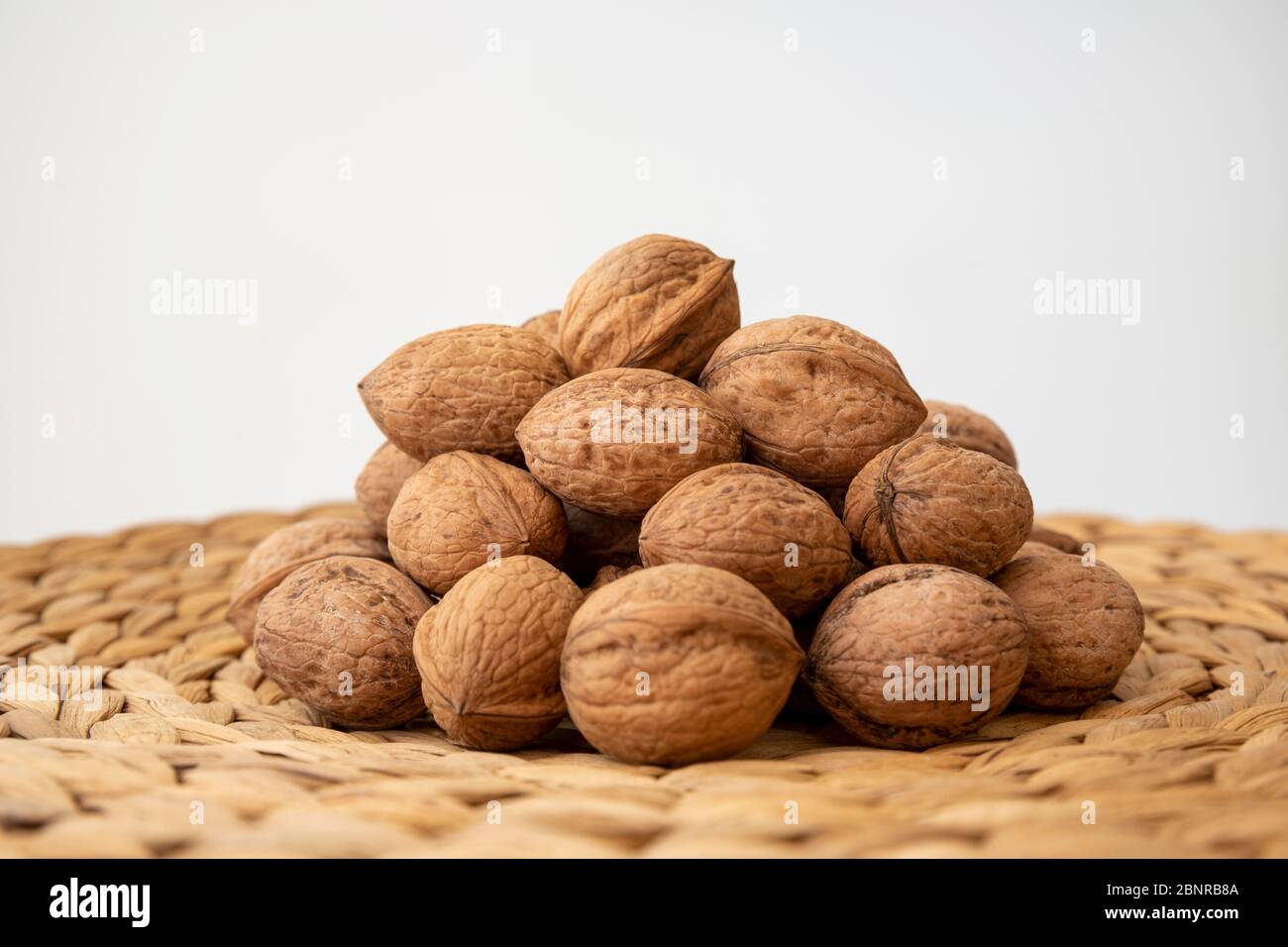 Front view natural walnut photo isolated Stock Photo - Alamy