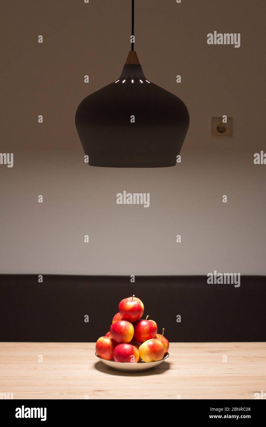 Apples on the kitchen table Stock Photo - Alamy