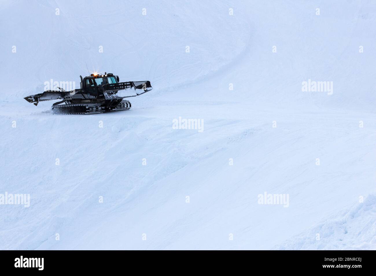 Snowcat in operation Stock Photo - Alamy