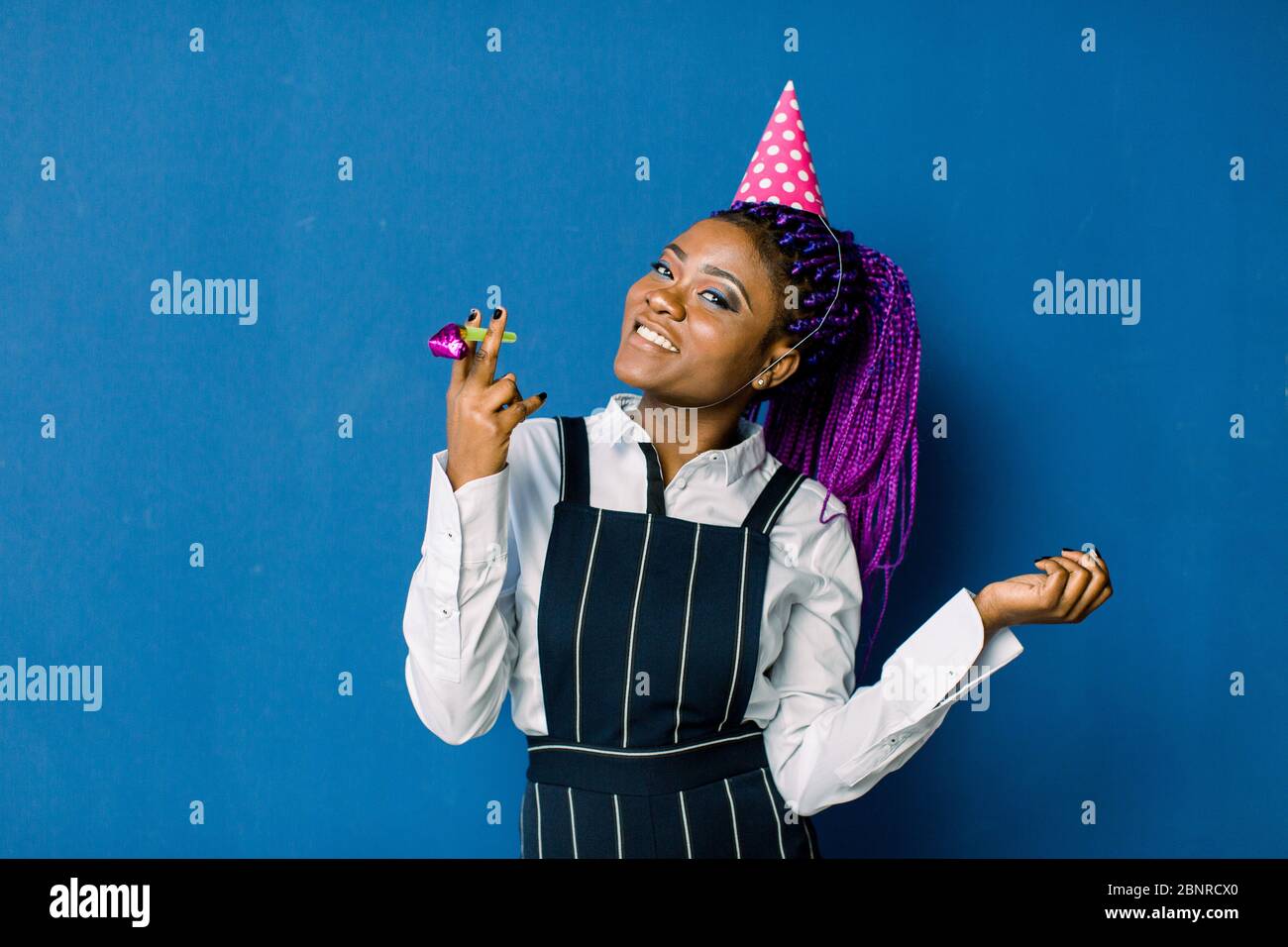 Portrait of beautiful african girl resting at party. Portrait of funny ...