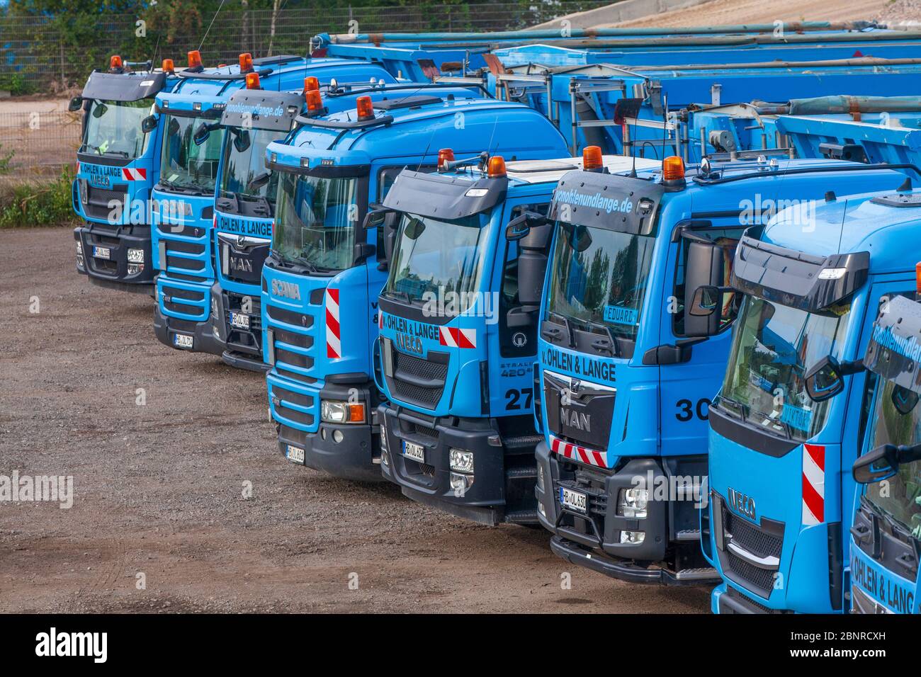 Blue trucks, vehicle fleet, company of Ohlen and Lange, building ...