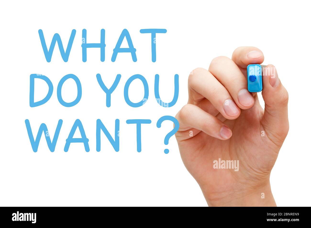 Hand writing the question What Do You Want with blue marker on ...