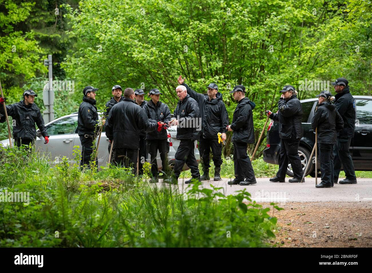 A police search team search woodland next to Stowfield Quarry near ...